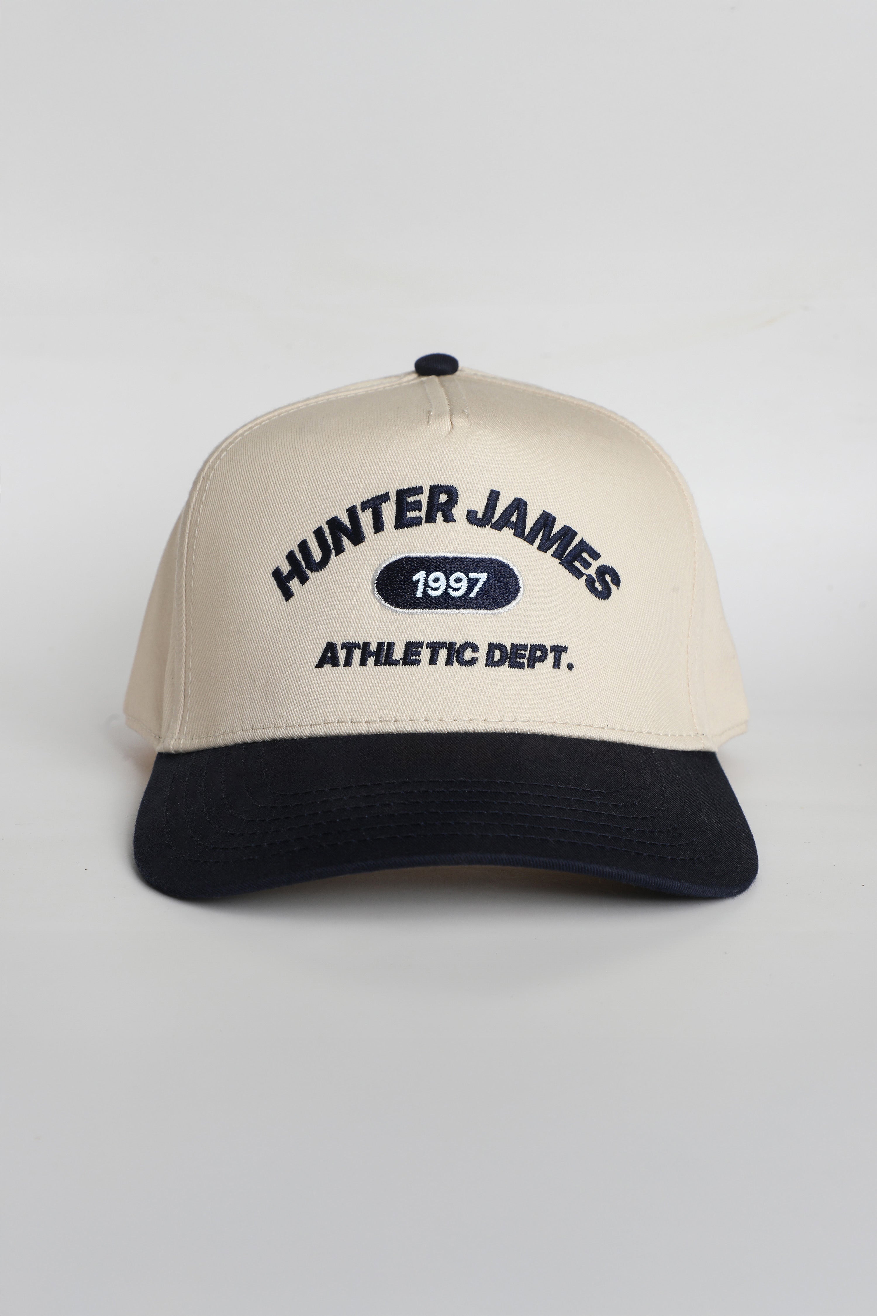 HUBER TRUCKER HAT | NAVY & NATURAL – HUNTER JAMES